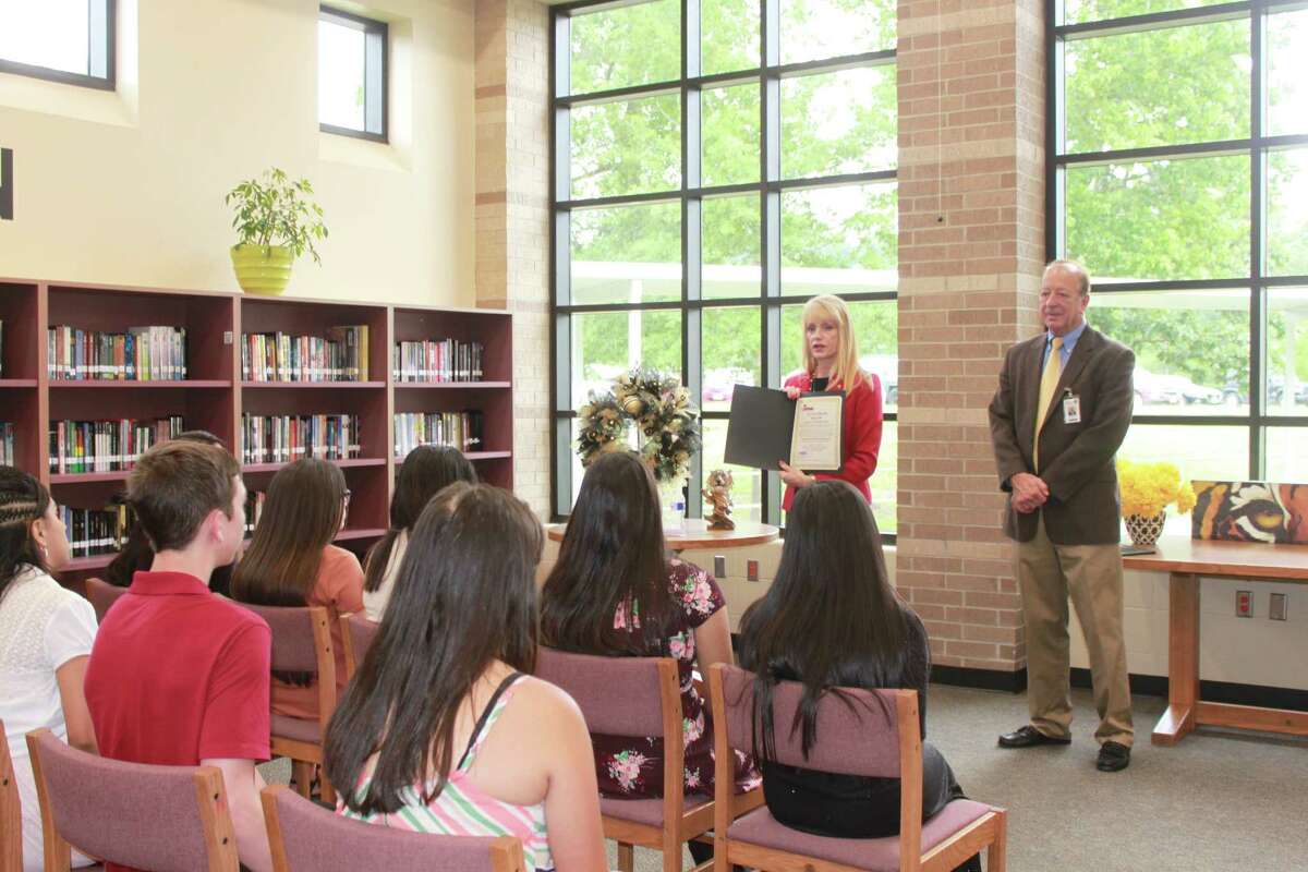 Conroe teacher, community pave path for 10 freshmen