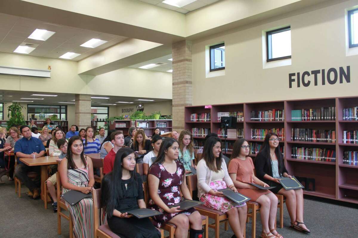 Conroe teacher, community pave path for 10 freshmen