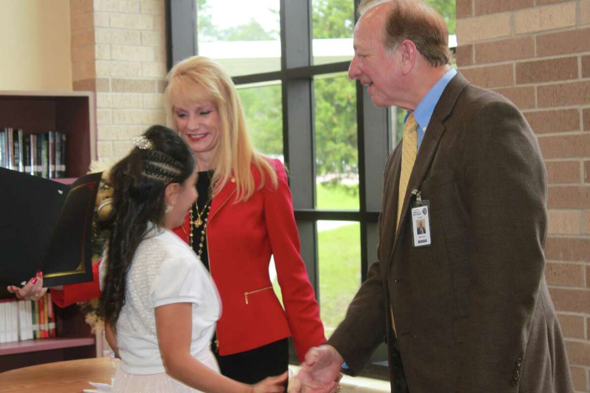 Conroe teacher, community pave path for 10 freshmen