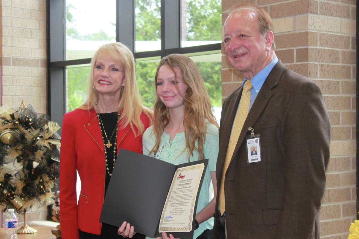 Conroe teacher, community pave path for 10 freshmen