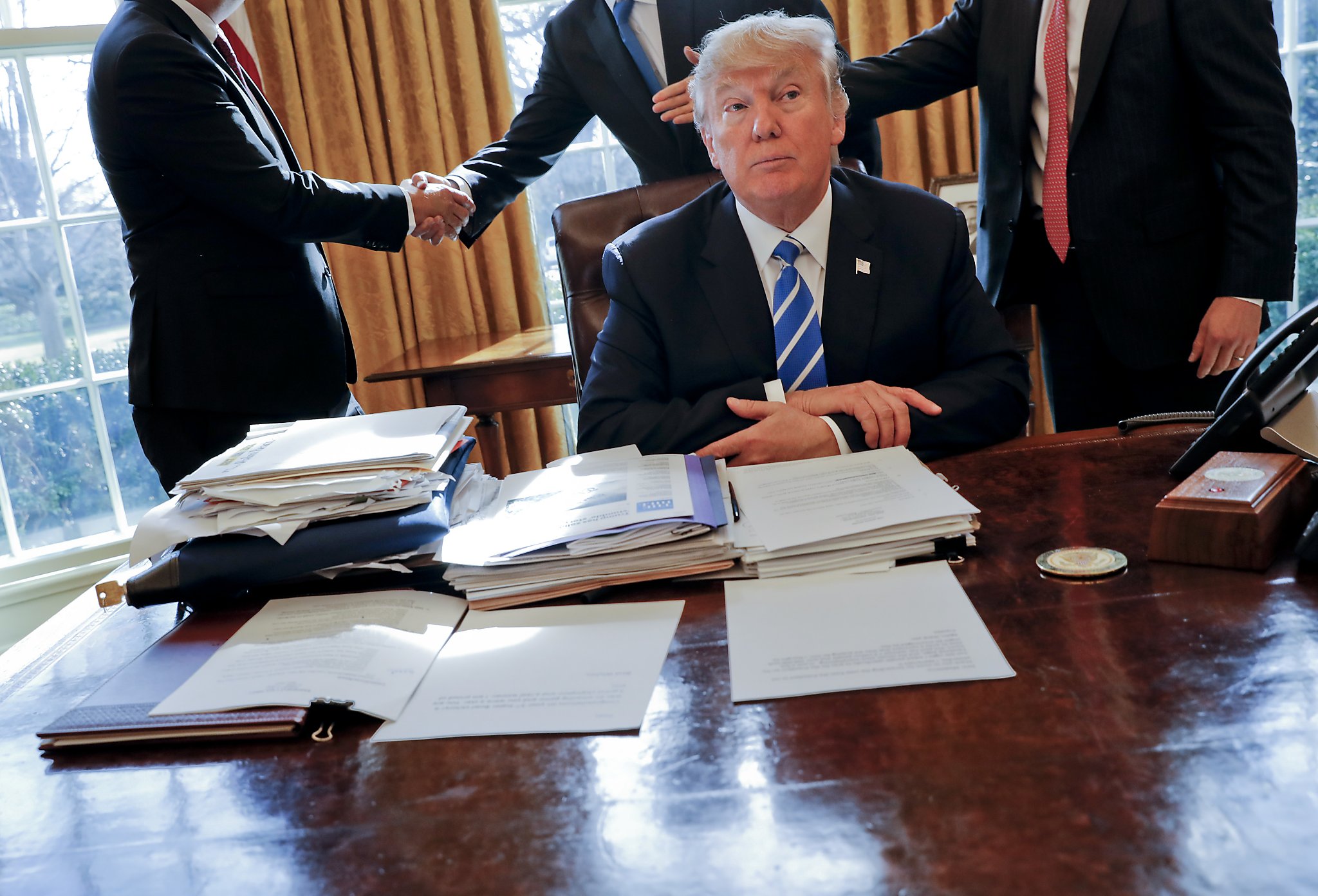Trump’s flip-flops and rookie mistakes damage 1st 100 days