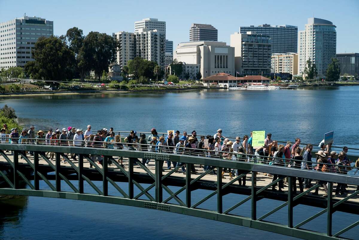 Thousands gather at Lake Merritt for anti-Trump climate march