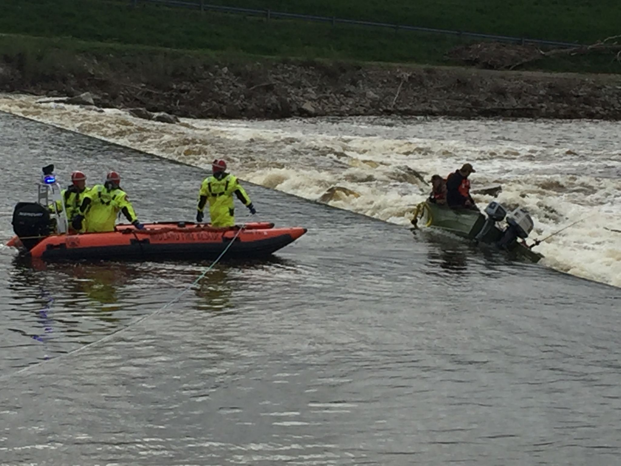 Boaters rescued from Dow dam