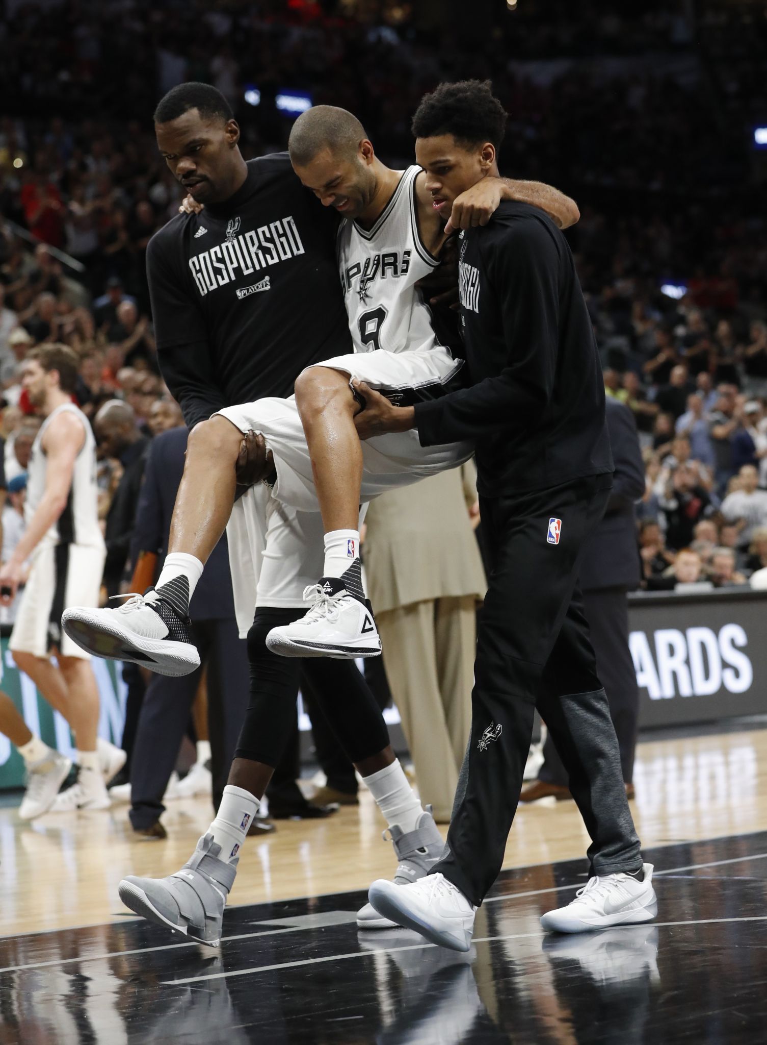 Spurs' Tony Parker sustains left leg injury and is carried off of the court