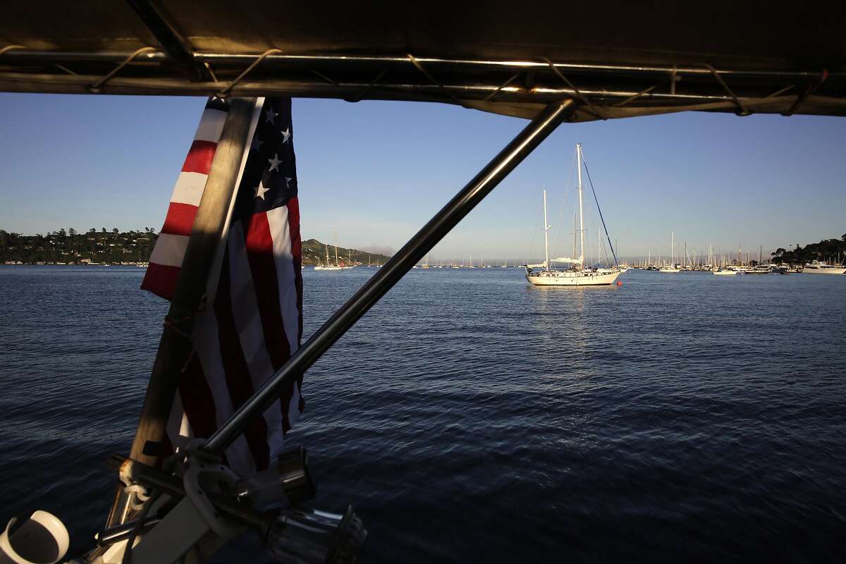 As more ‘anchor-outs’ live on SF Bay, tension mounts on land