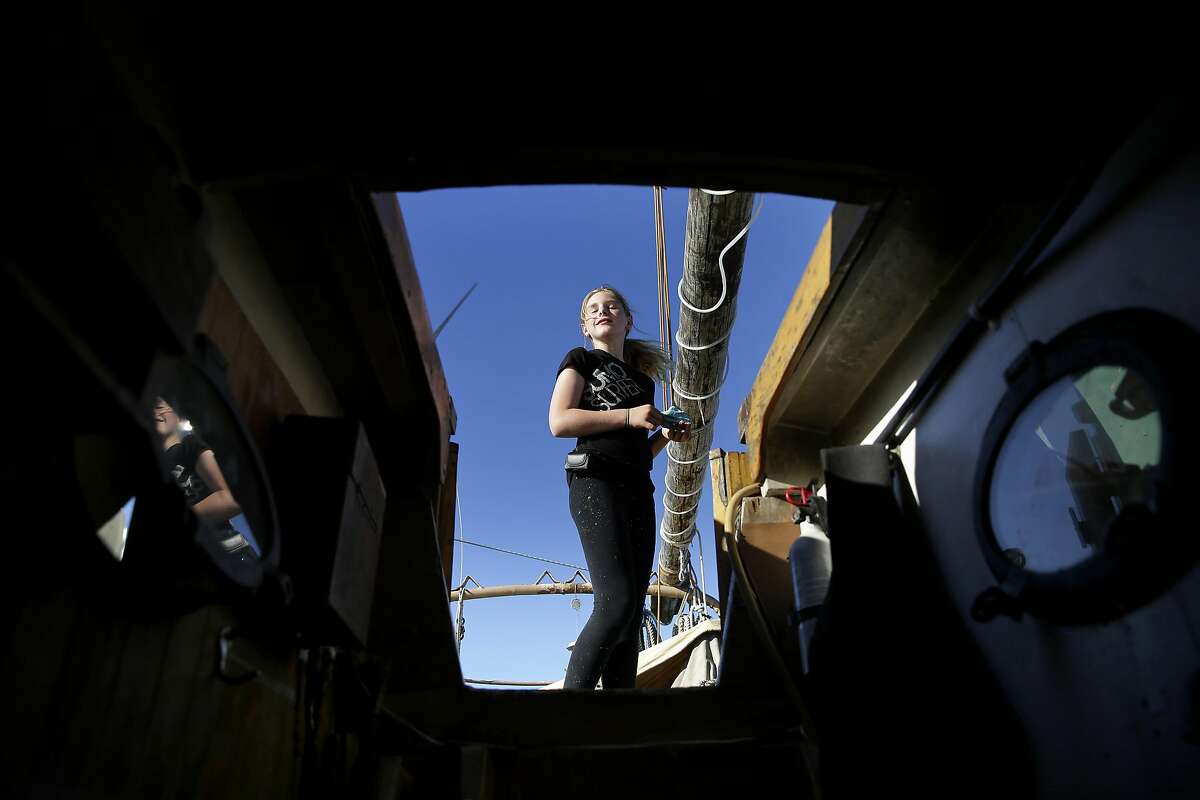 As more ‘anchor-outs’ live on SF Bay, tension mounts on land