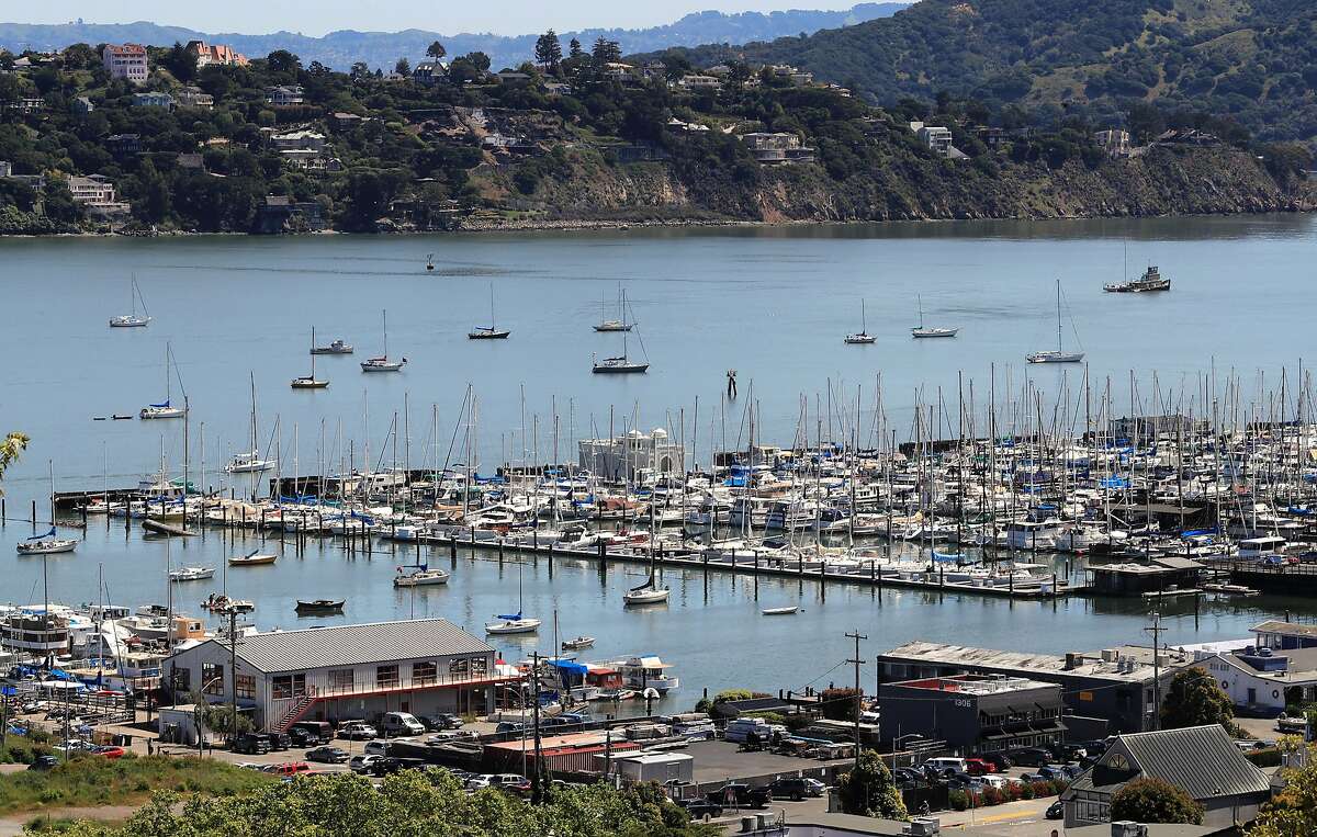 As more ‘anchor-outs’ live on SF Bay, tension mounts on land