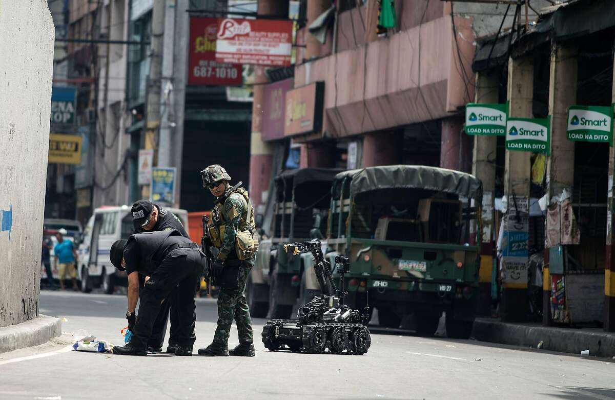 Conflicting claims over bombing in Manila