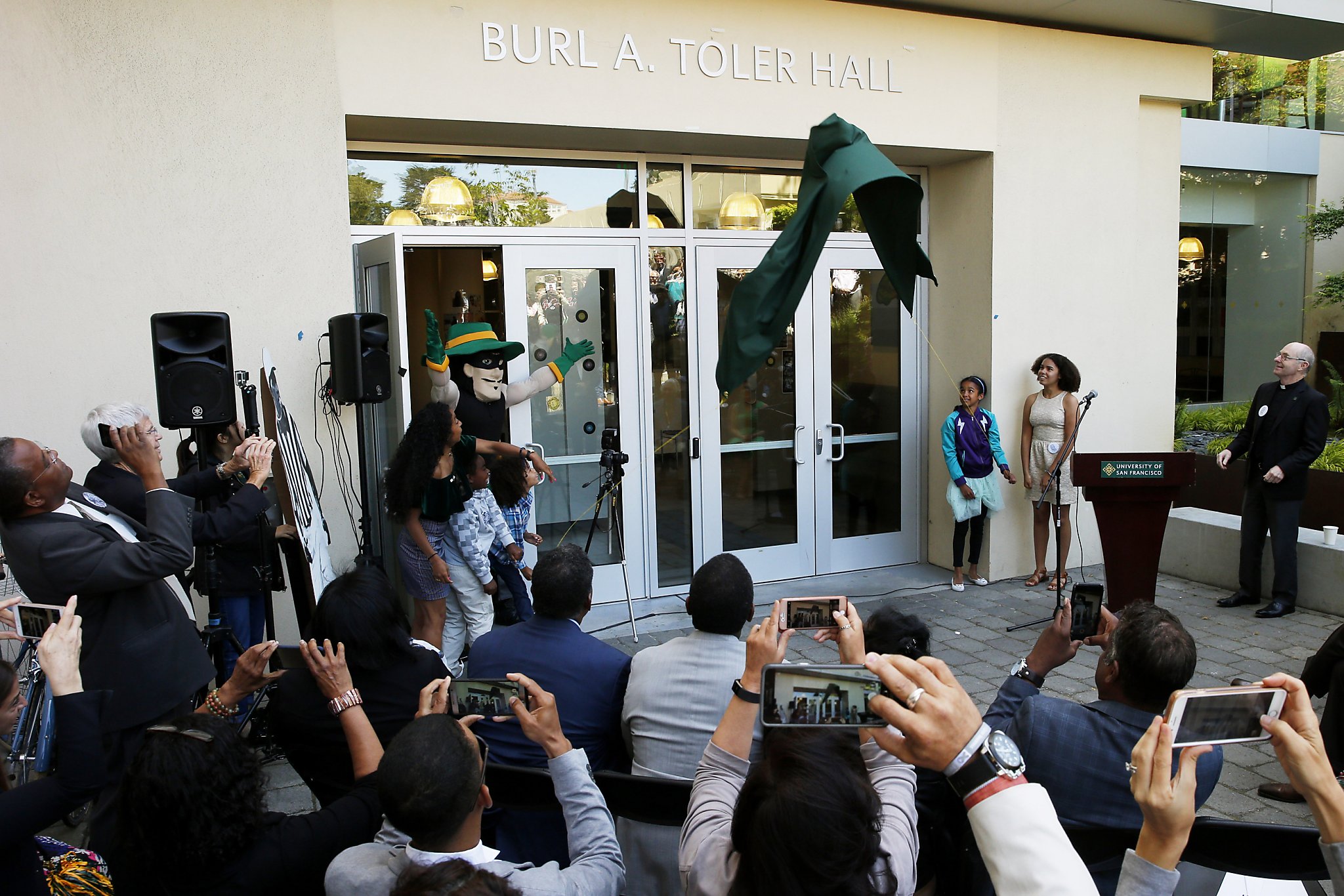 Unfurling an honor for Toler