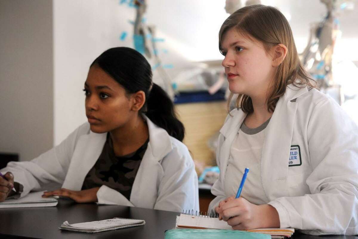 Judge tosses school tuition challenge Judge tosses school tuition challenge