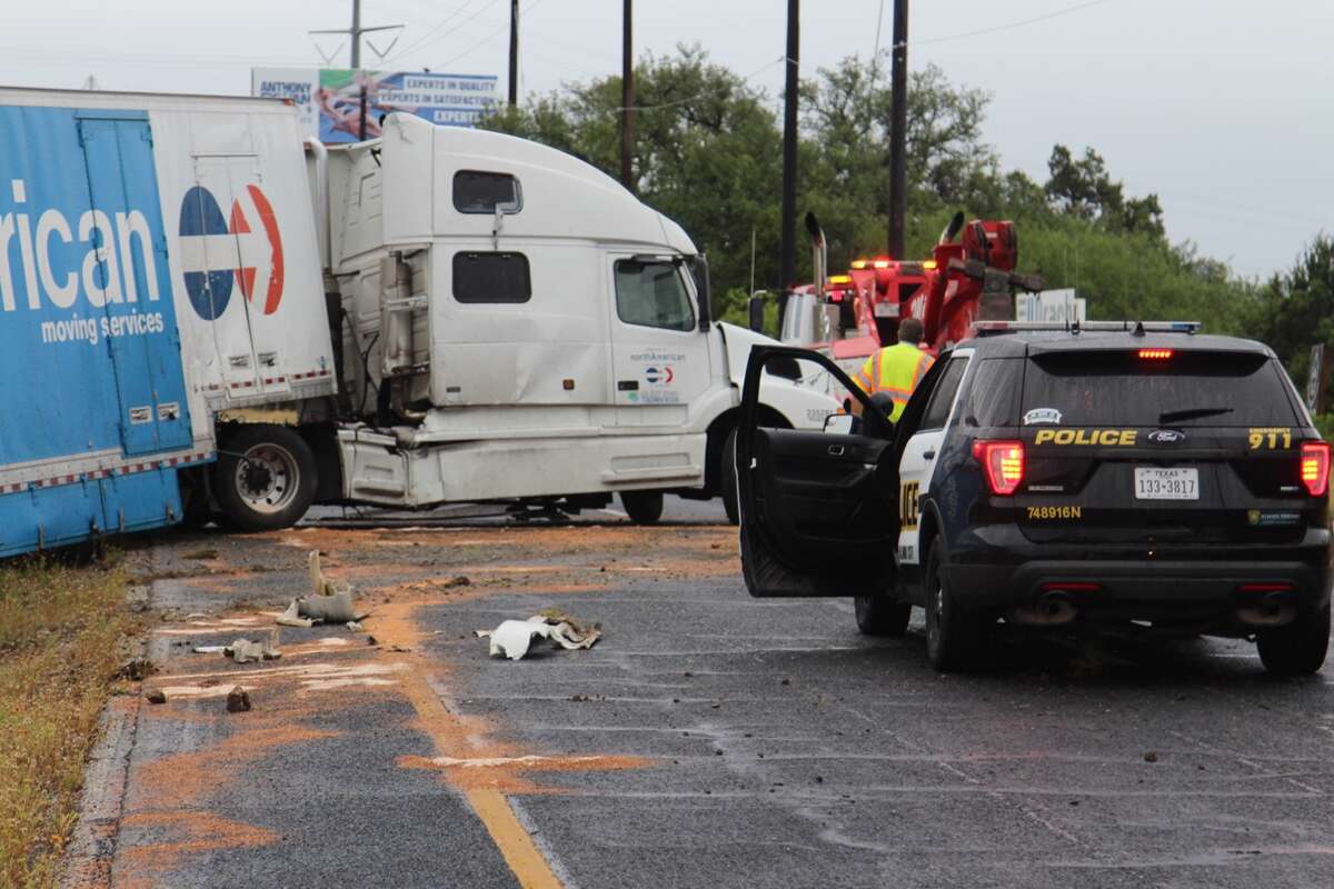Truck flips, 18-wheelers jackknife as wet roads affect morning commute ...