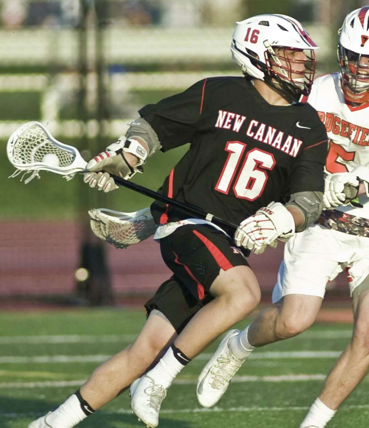 Ridgefield boys lacrosse beats New Canaan