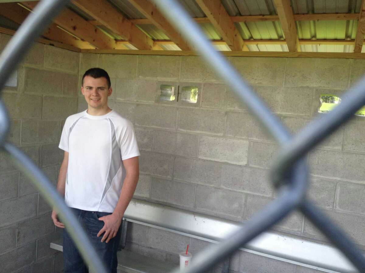 Cobleskill student pitches in to build dugouts