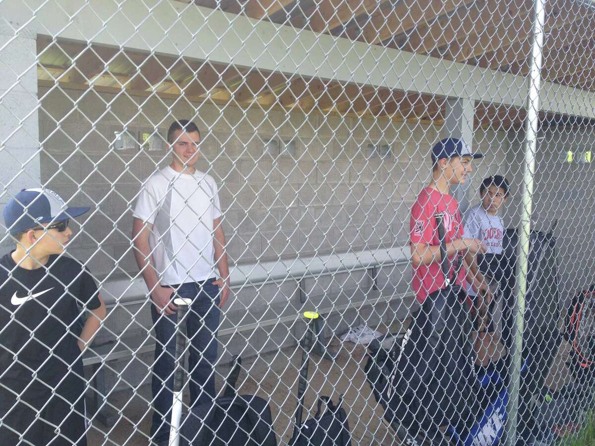 Cobleskill student pitches in to build dugouts