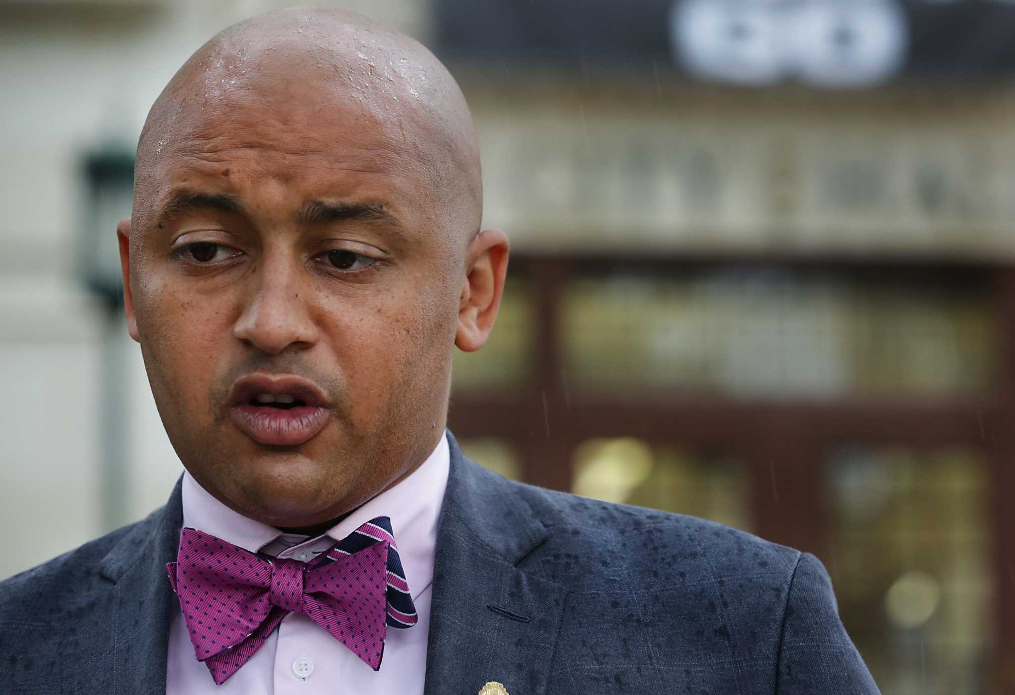 Video shows Warrick passed out on City Hall bench twice