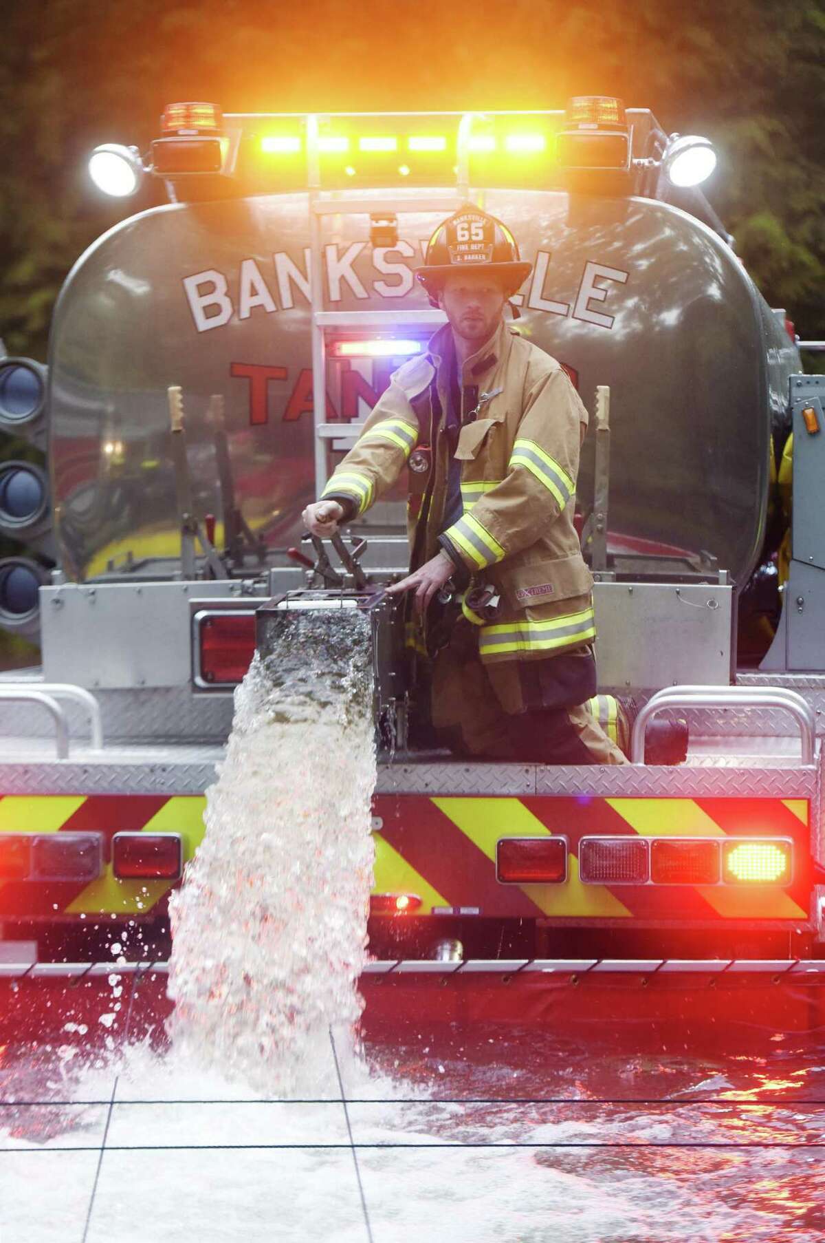 Stamford firefighters practice shuttling water to remote locations