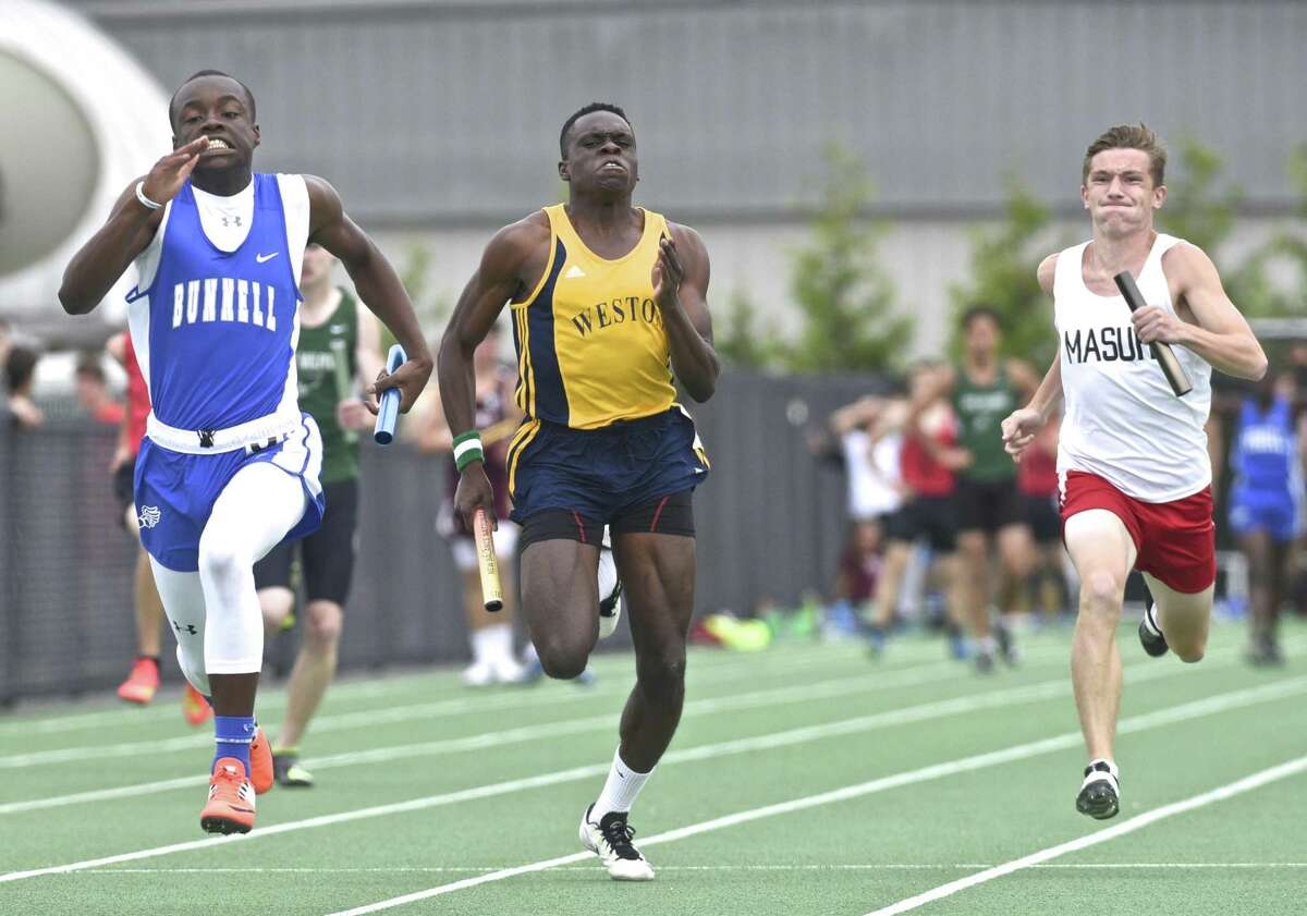 New Milford boys, Newtown girls win SWC track and field titles