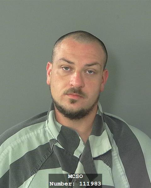 Conroe evading arrest suspect sends a clandestine insult via his mugshot