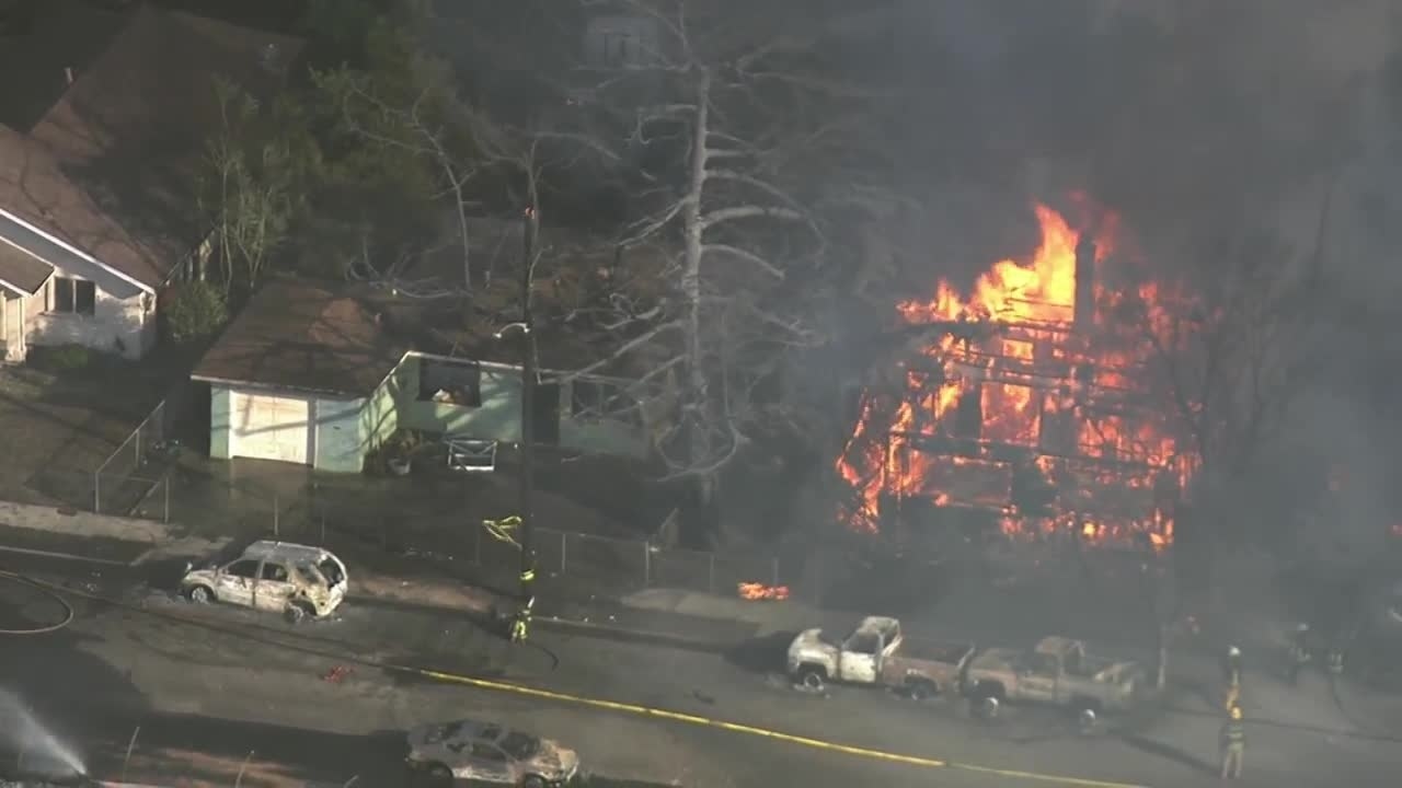 Homes threatened by large fire burning in downtown Stockton