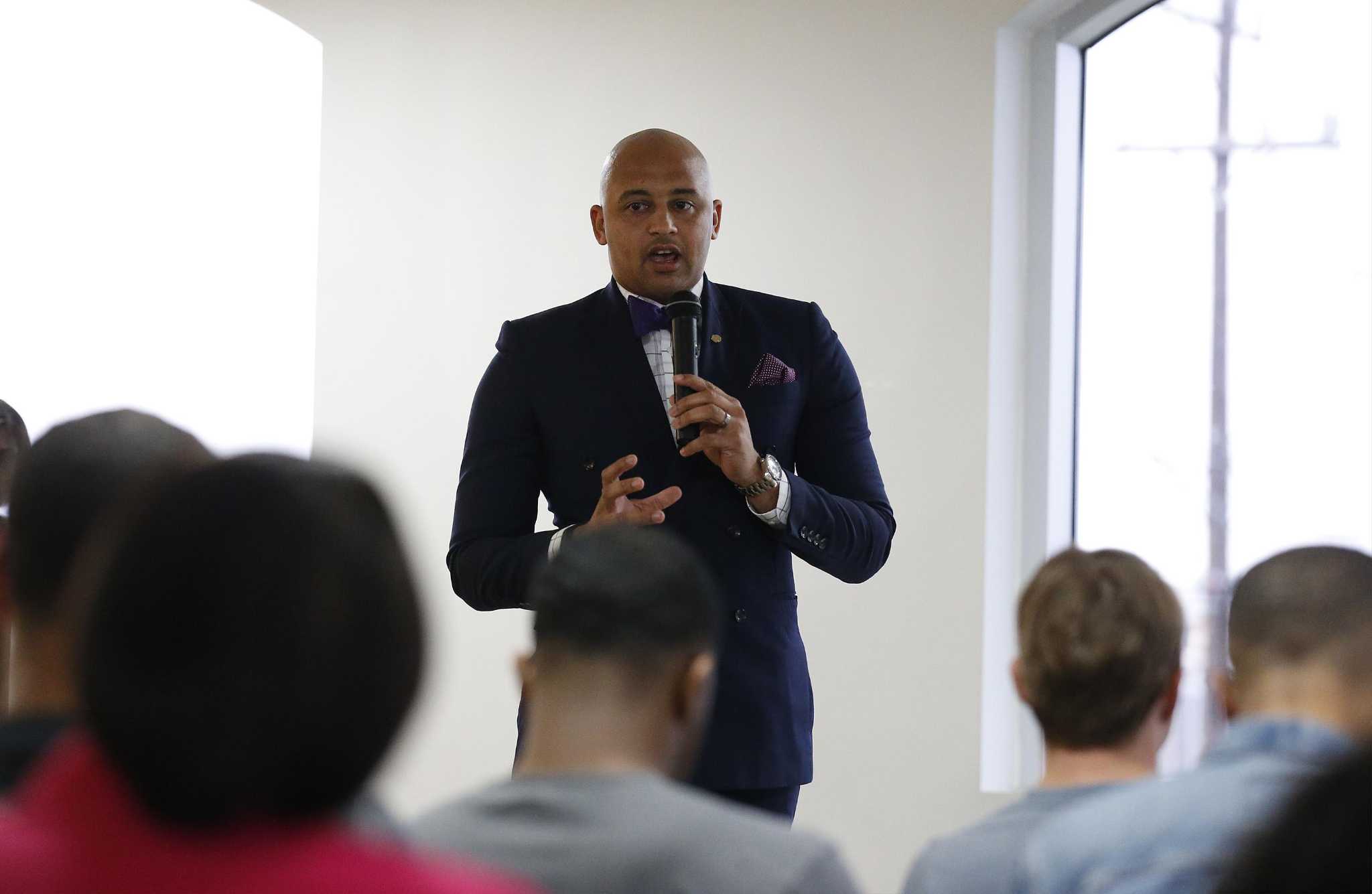 Warrick acknowledges passing out outside City Hall