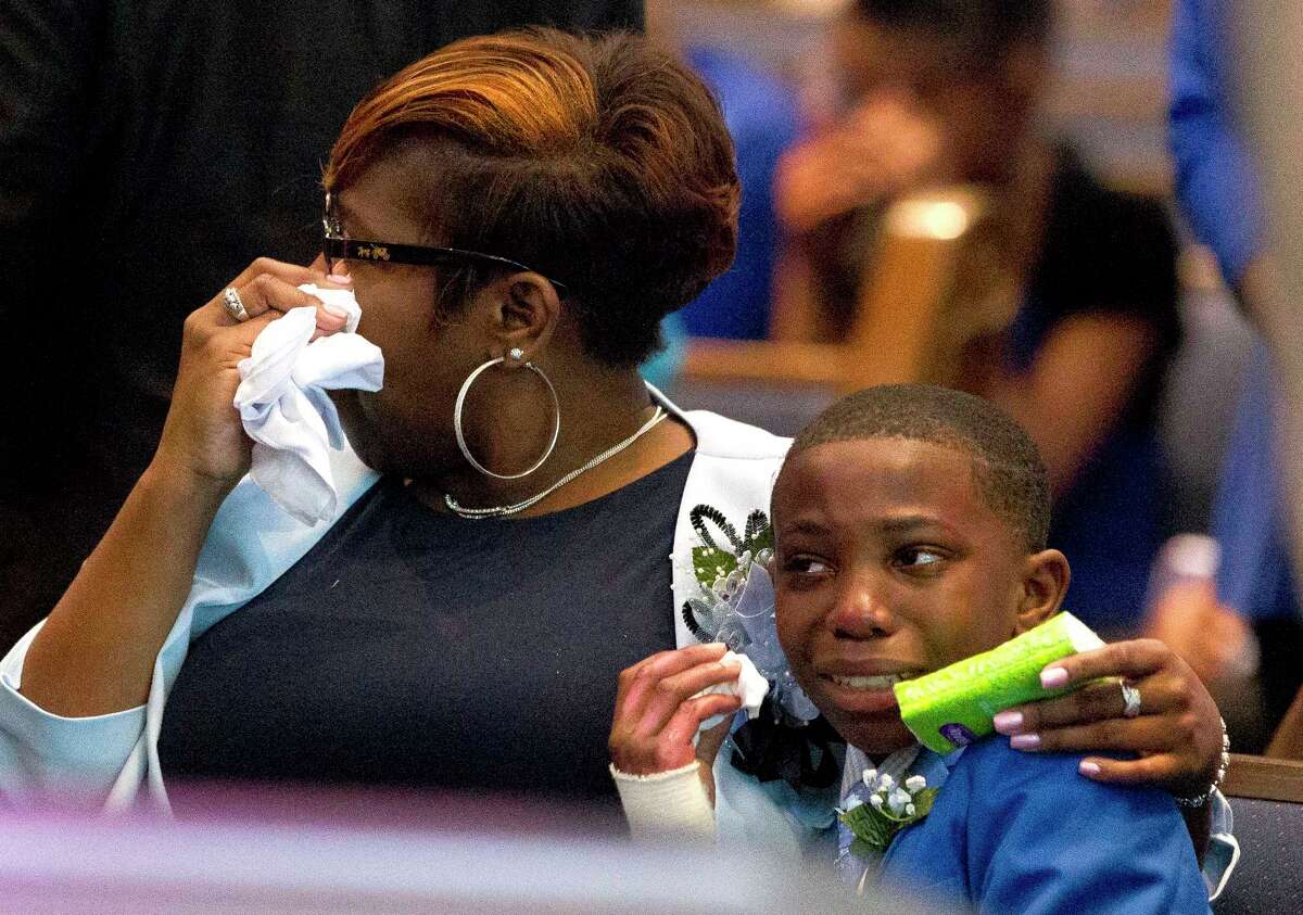 Mitchell children's light rises above tragic house fire