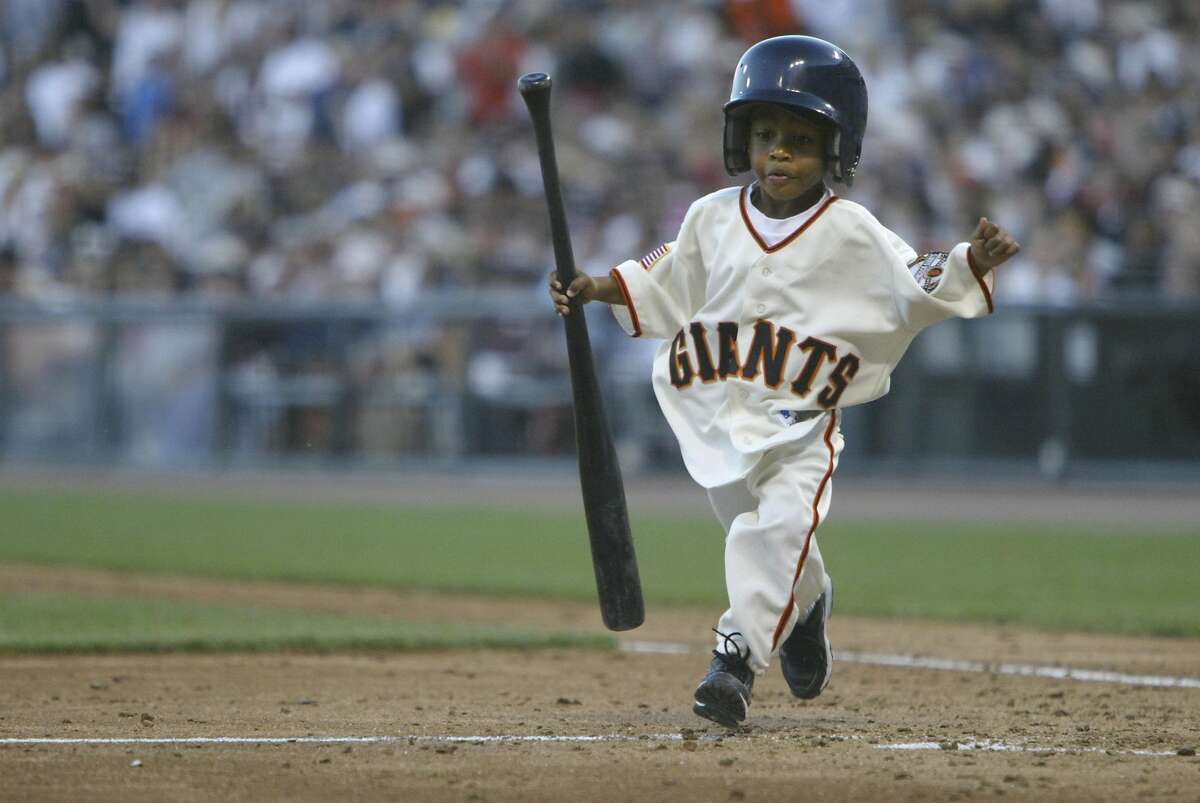 The little batboy who could: Darren Baker, now 18, grows up