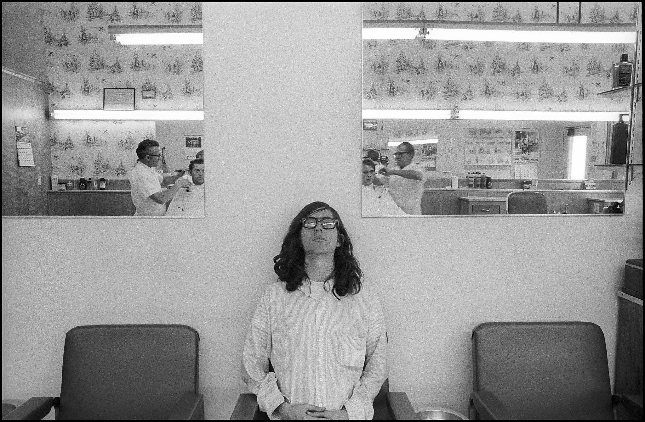 Mike Mandel shows off his baseball card collection at SFMOMA