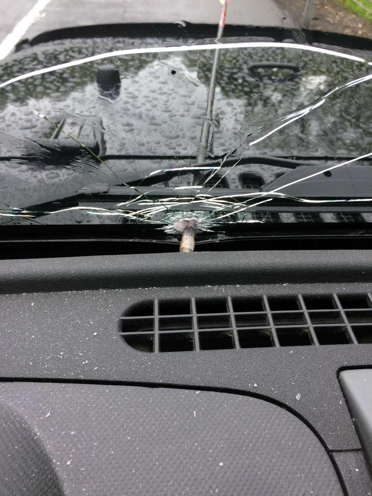 Arrow pierces windshield of moving car in Schodack