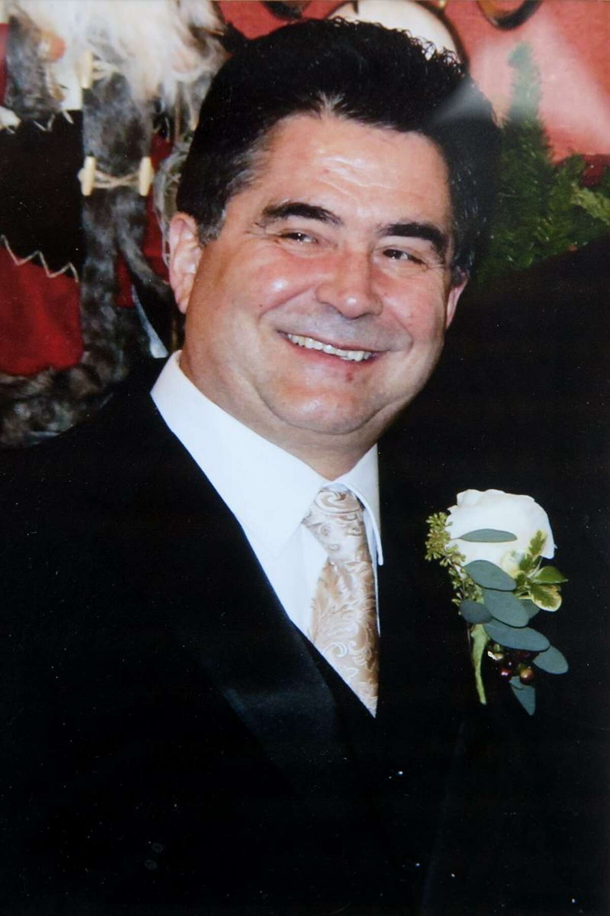 Bridgeport dedicates street, flag raising to slain grocer