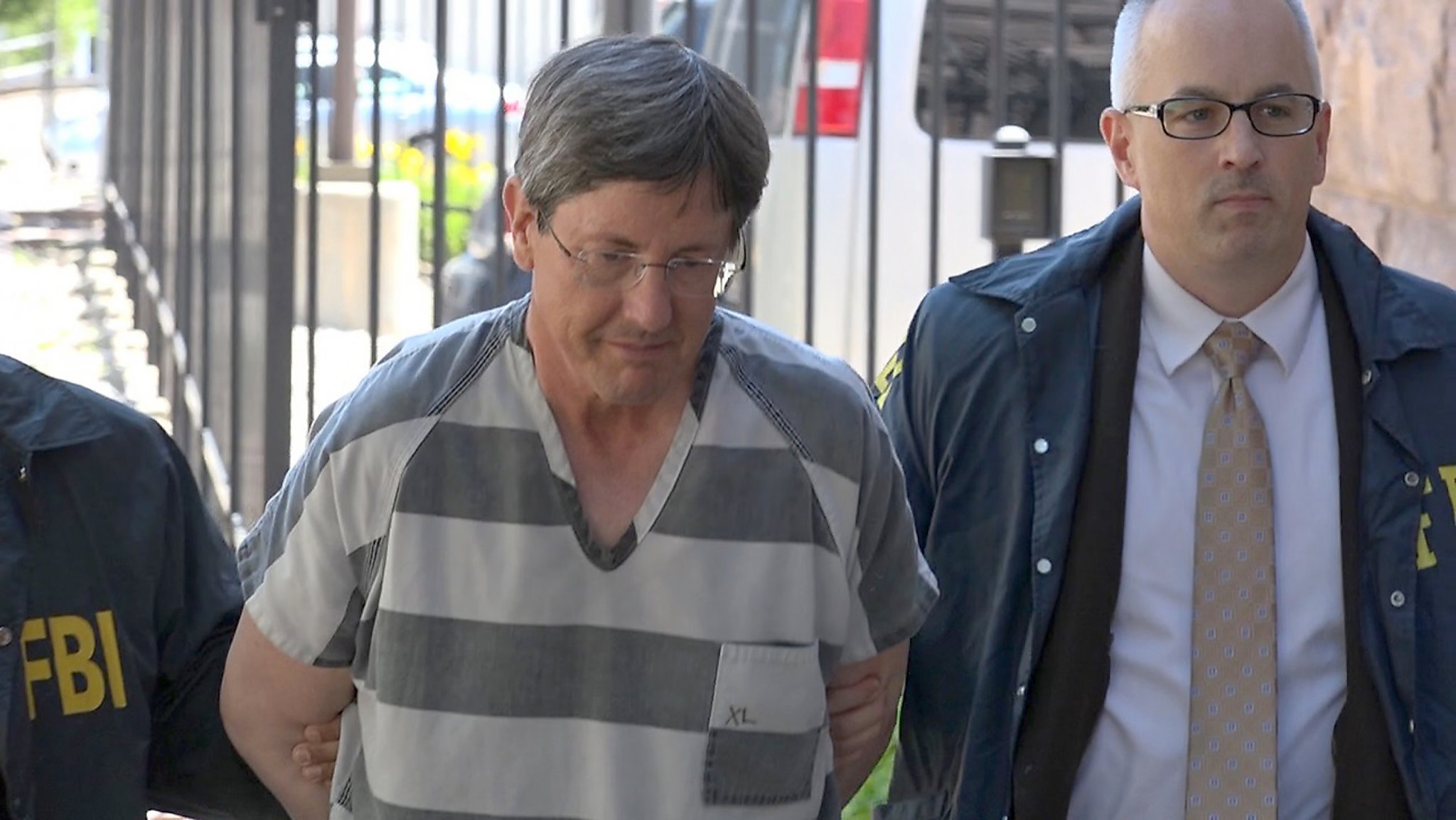 Captured polygamous sect leader pleads guilty in escape, fraud cases