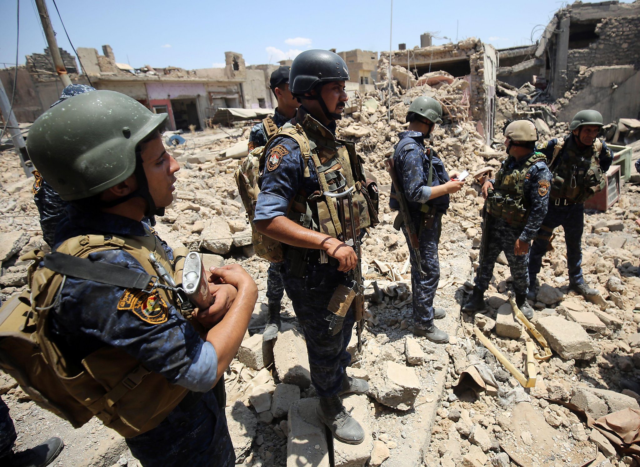 Battle begins for key Mosul district