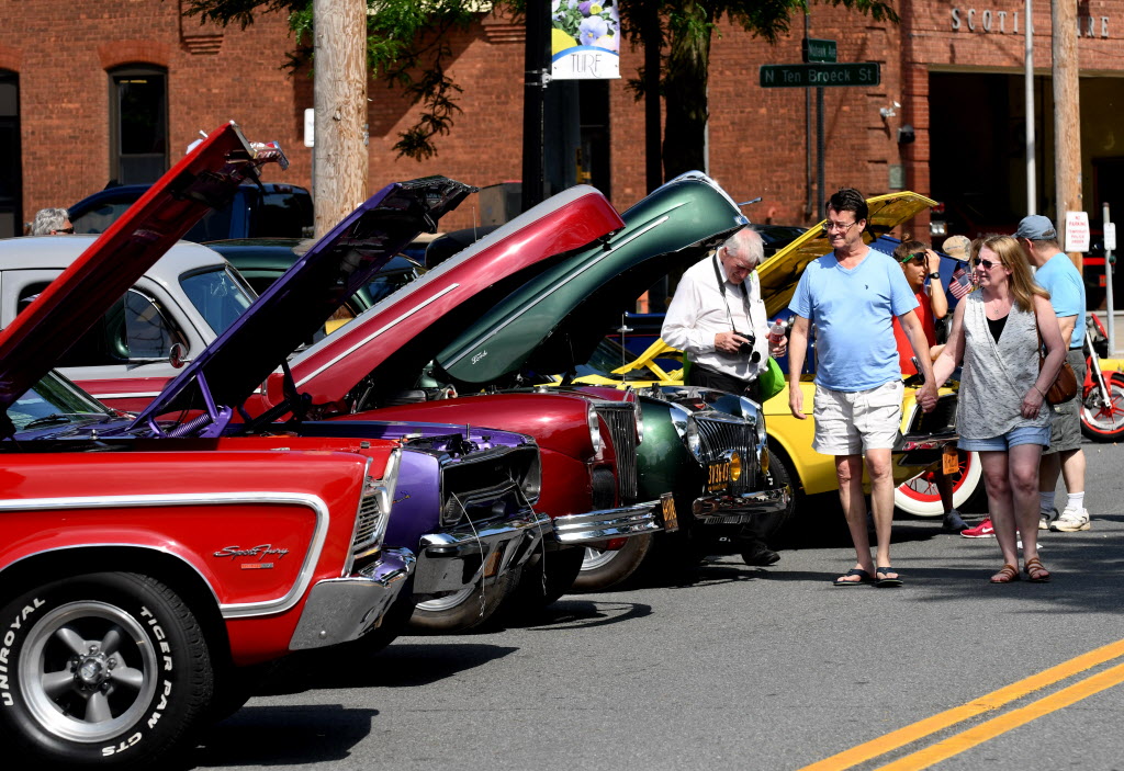 A parade of cars: Porsche, GTO, Camaro and more