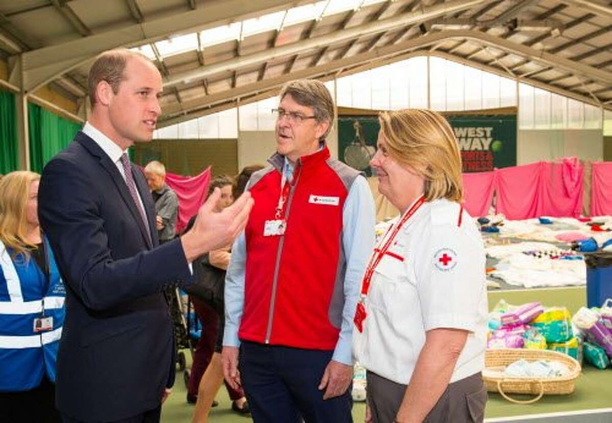 Prince William hugs fire survivor, ignoring royal protocol and bringing ...