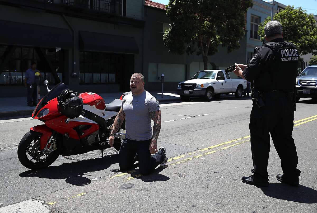 Motorcyclist detained for driving at protesters on SF street