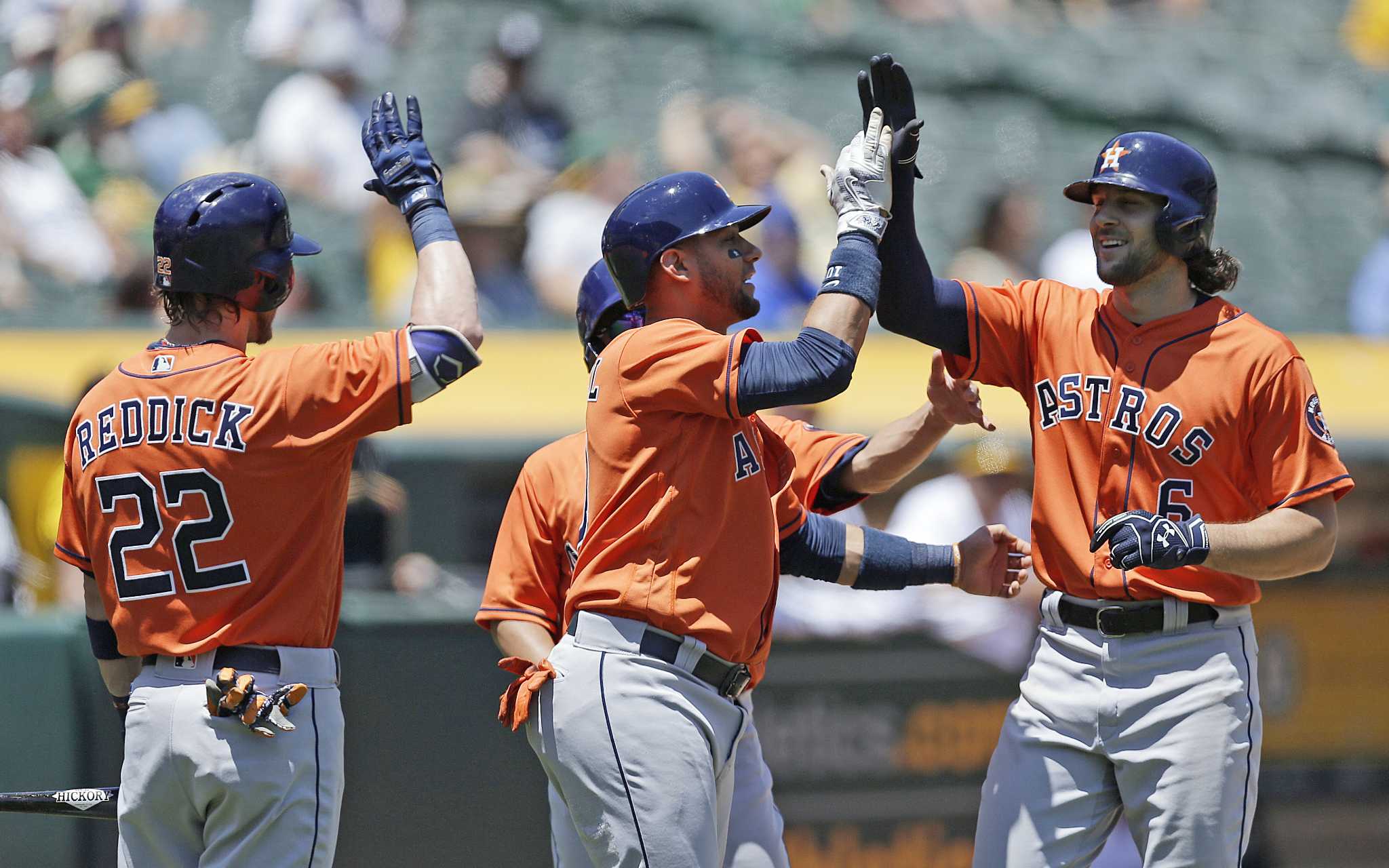Astros' 50th win starts with scare, ends with sweep of A's