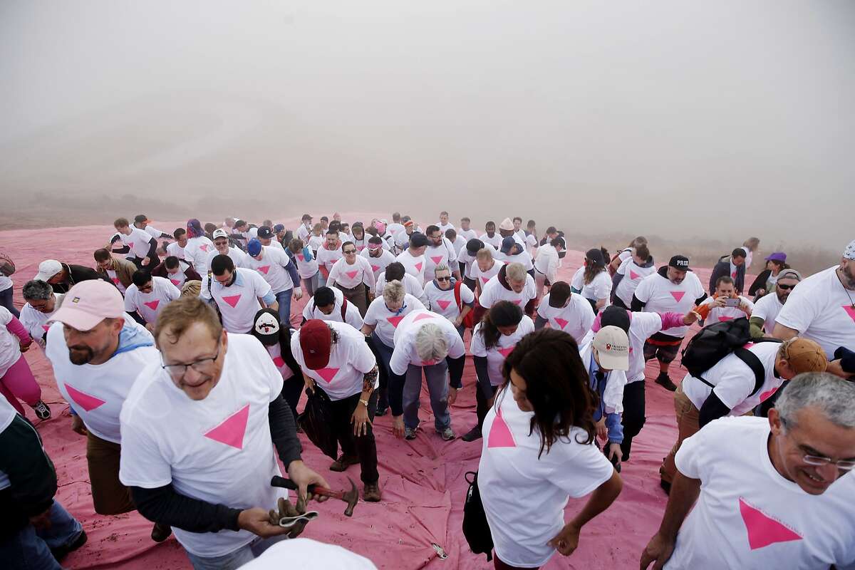 Pink triangle rises again as symbol of pride for LGBT community