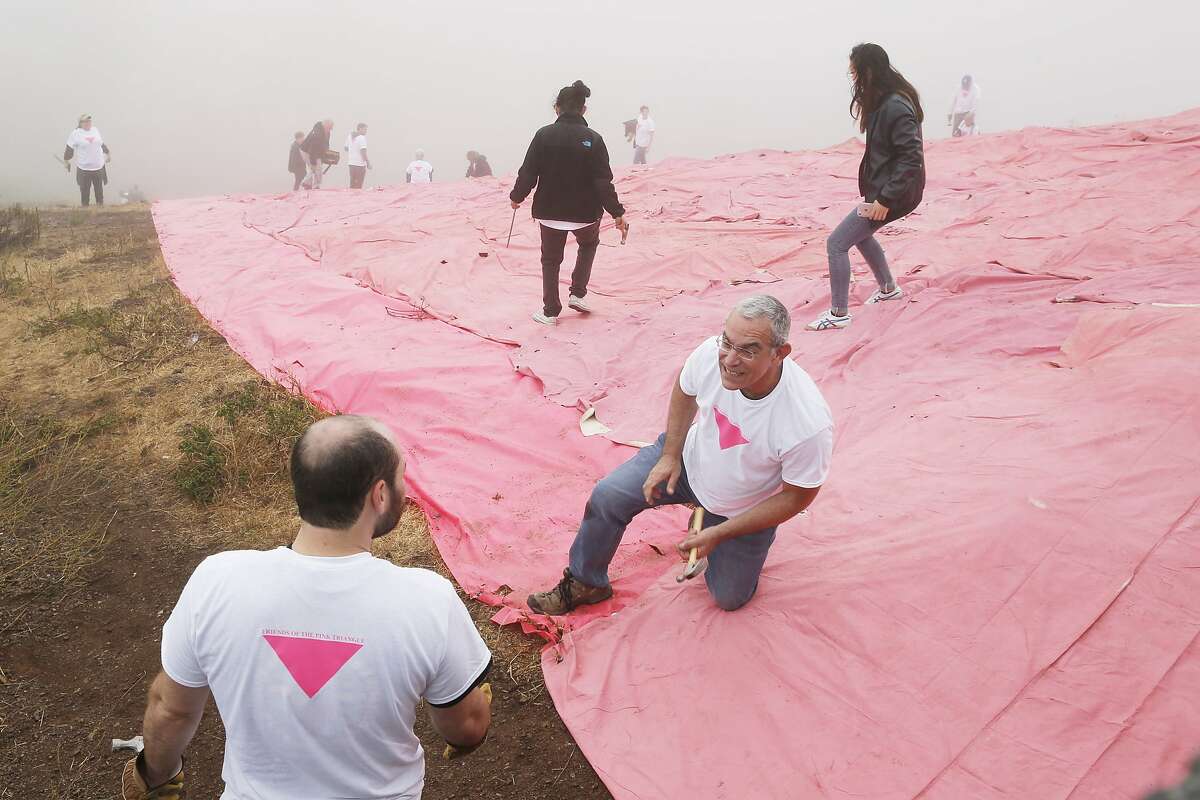 Pink triangle rises again as symbol of pride for LGBT community