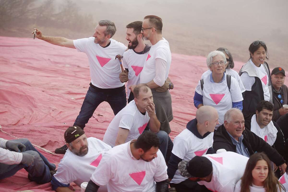 Pink triangle rises again as symbol of pride for LGBT community