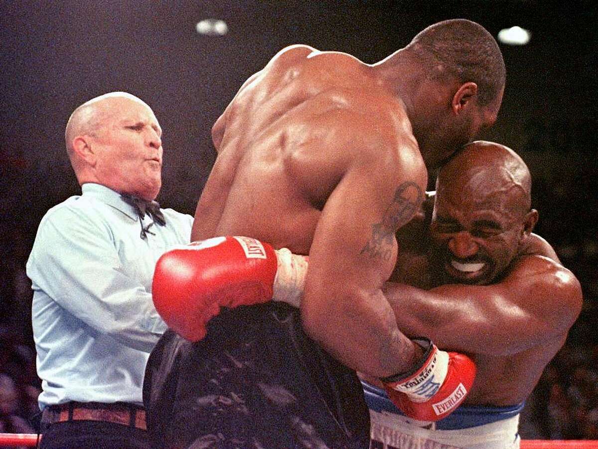 Mike Tyson took a bite out of both Evander Holyfield's ears 20 years ...
