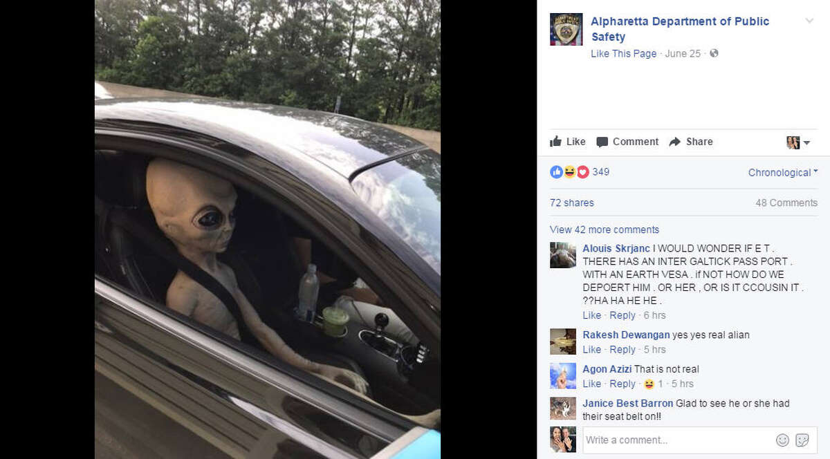 Police pull over speeding car, find alien in the passenger seat