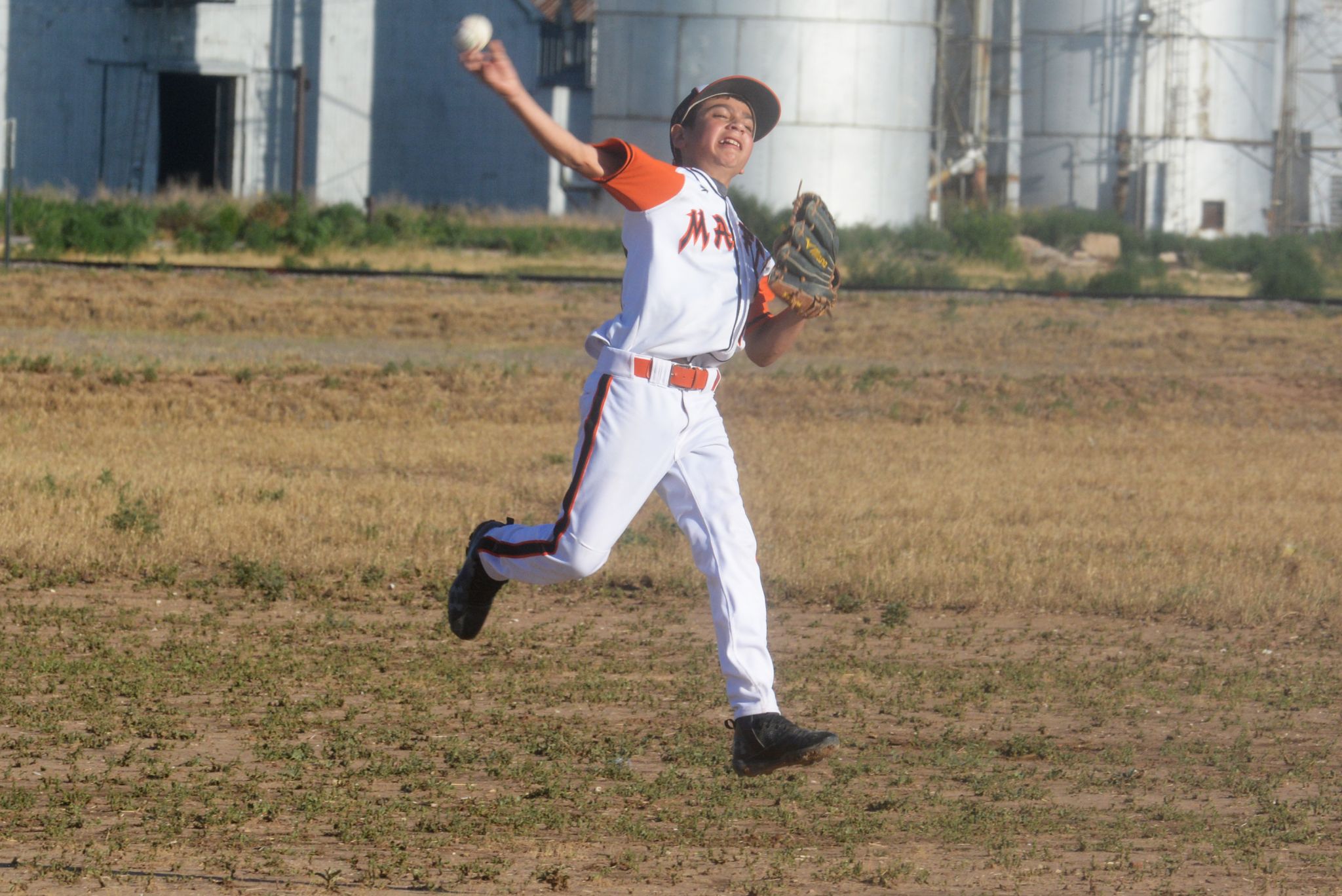 Baseball team practices on sandlot field of dreams