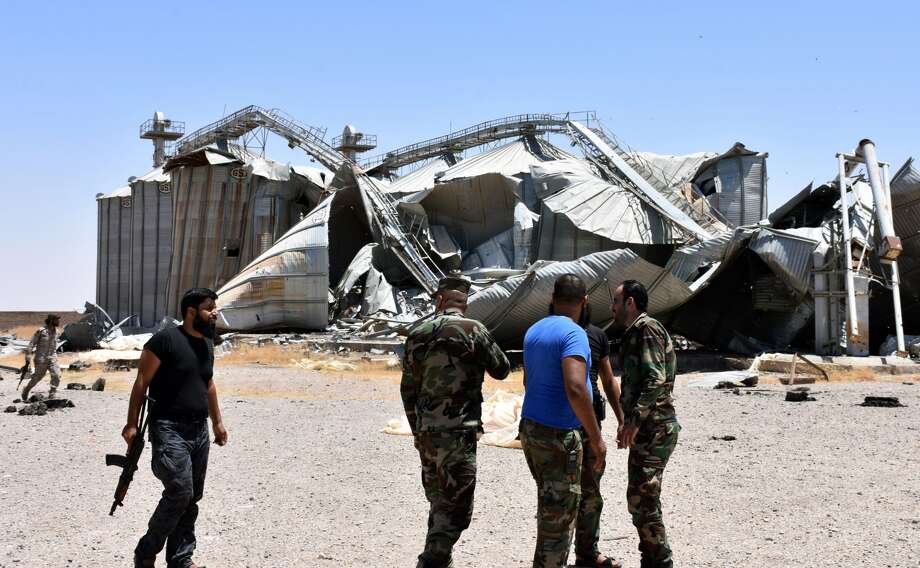 World news photos: Battle over bulls, Syrian leisure moment and more ...