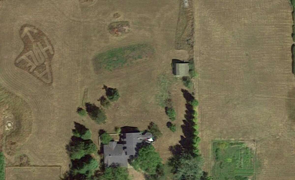 Google Earth reveals neighbor's insult carved into the grass