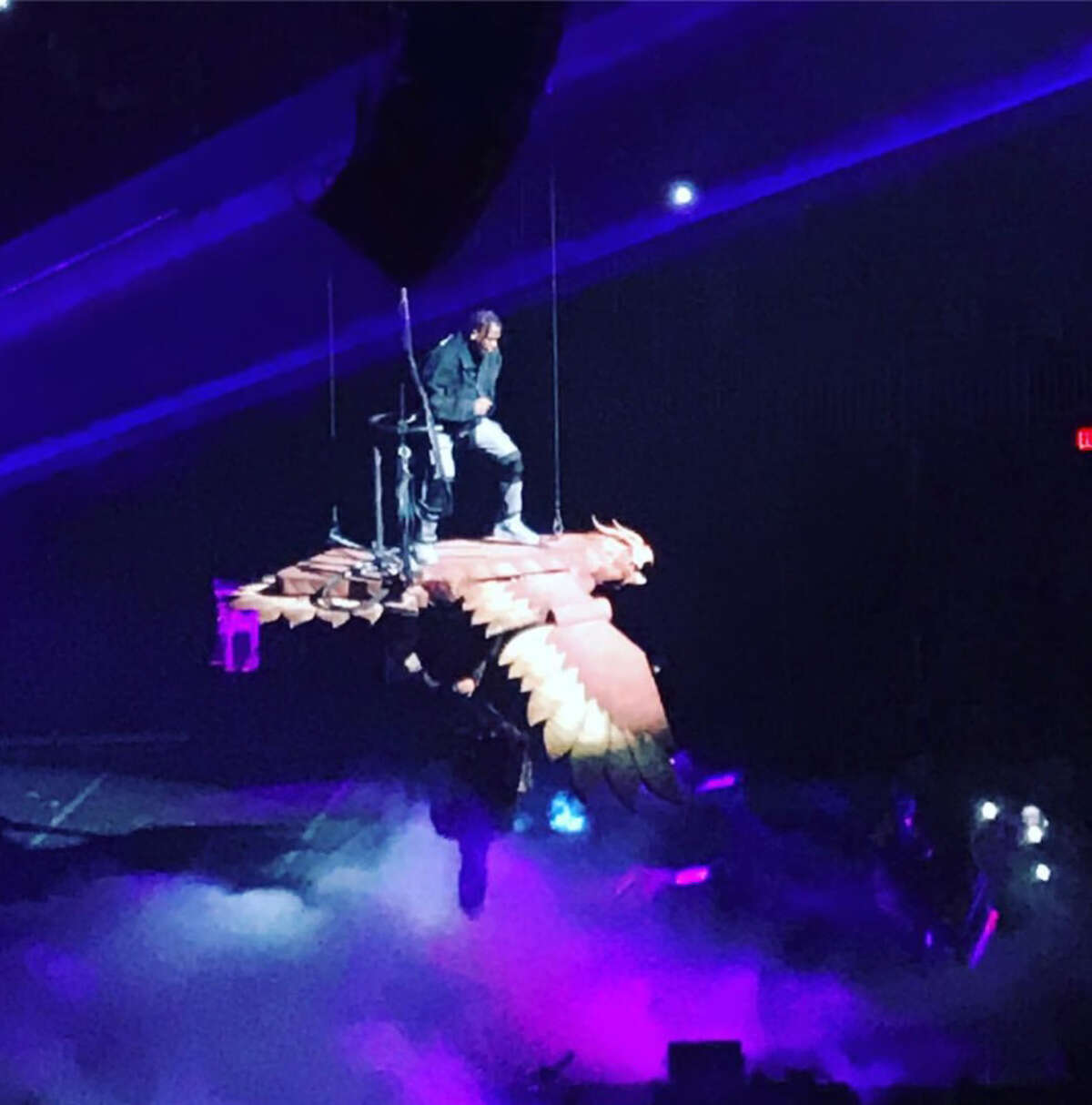 Watch Travis Scott fly atop a mechanical bird at tour kickoff