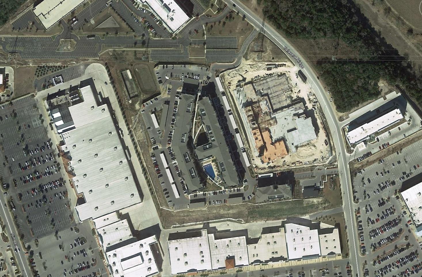 Chicago firm buys Axis luxury apartment complex at The Rim