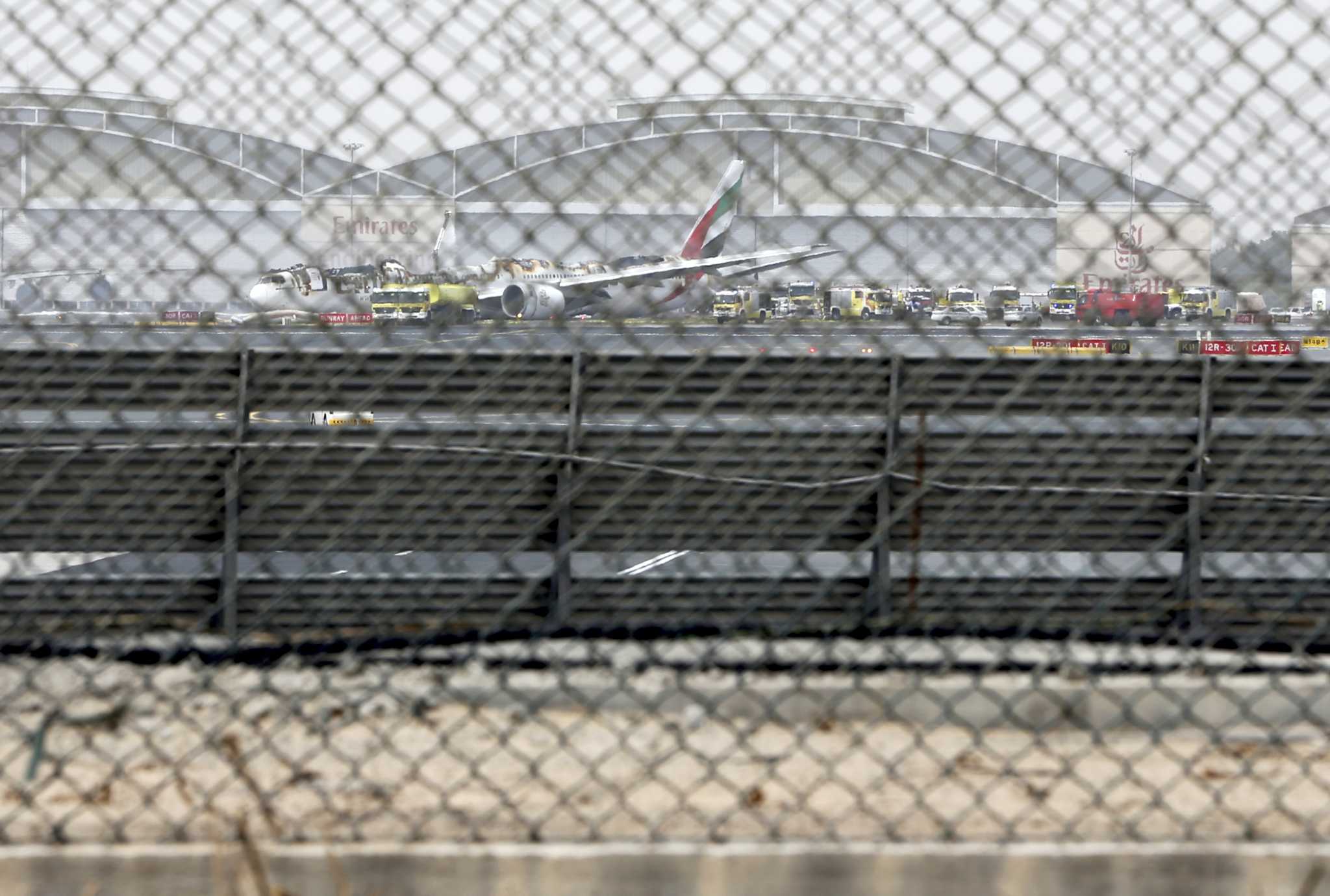 Emirates airliner with 300 onboard crash lands in Dubai