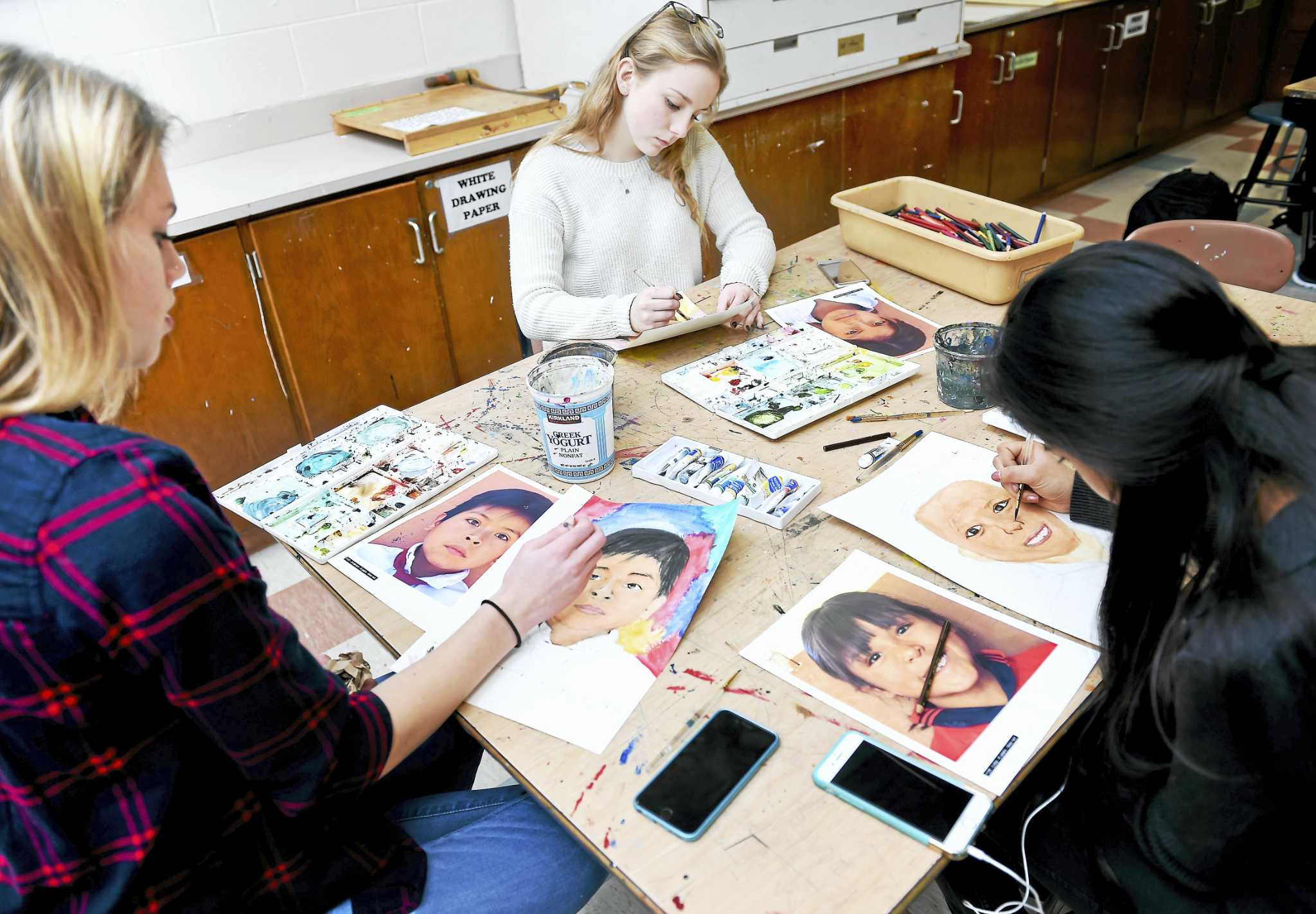 Amity High School students create portraits of Bolivian children for ...
