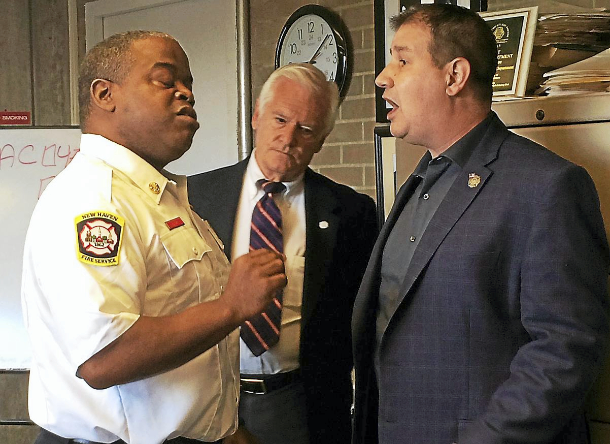 Video: New Haven fire union president confronts chief at promotion ceremony