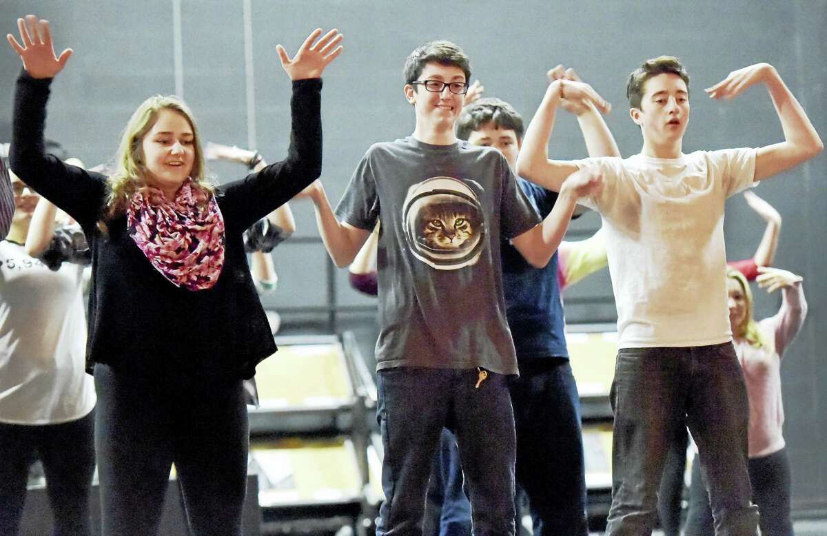 North Branford High School students prepare their rendition of ‘Grease’