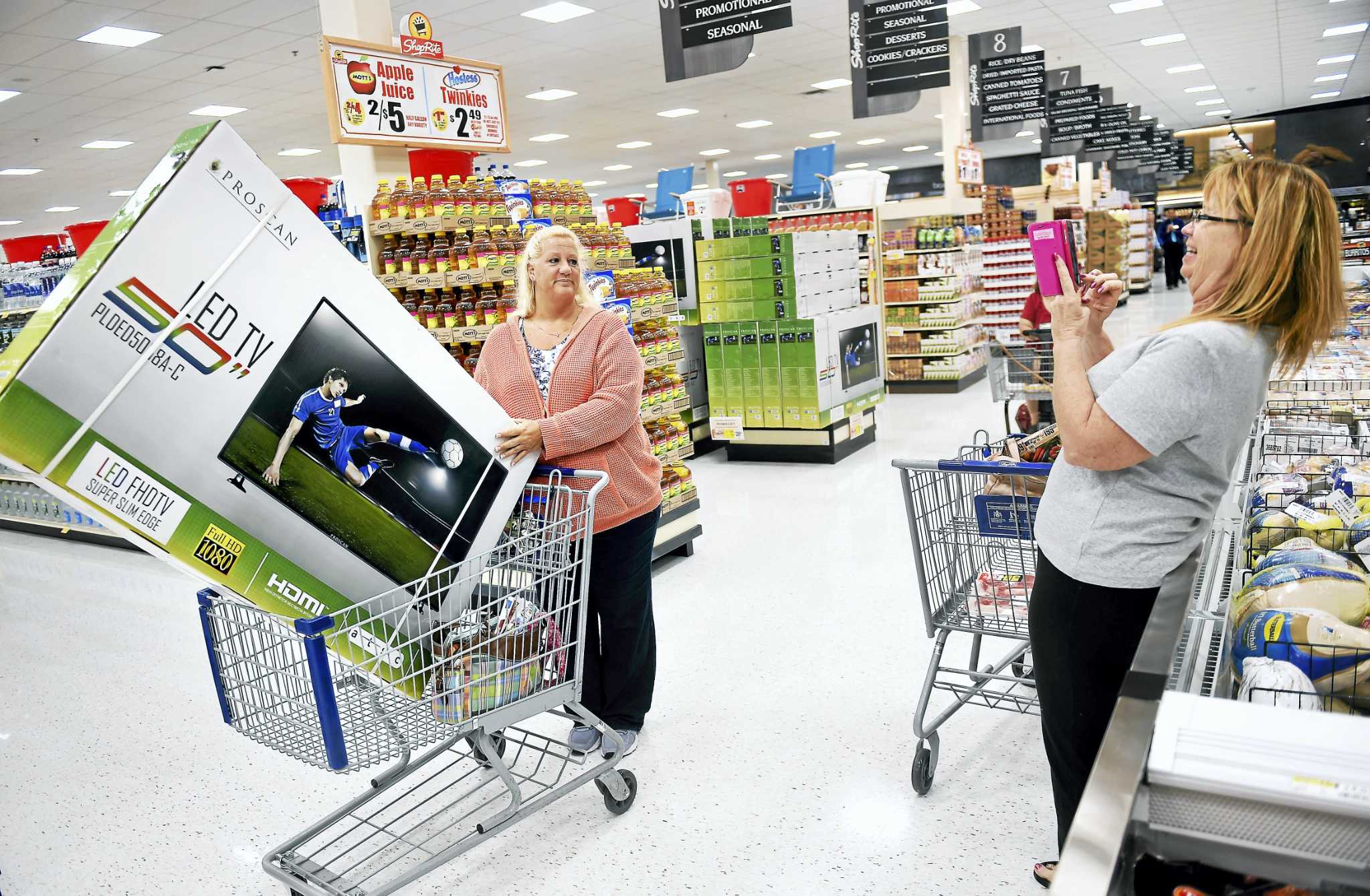 Grocery shoppers pack ShopRite’s new, expanded store in Milford